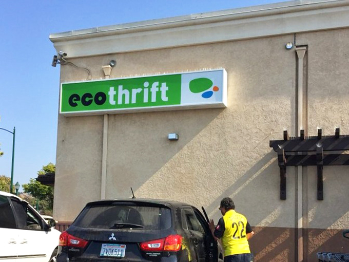 The iconic green sign that signals to bargain hunters: "Your treasure quest begins here." California thrifting at its finest.