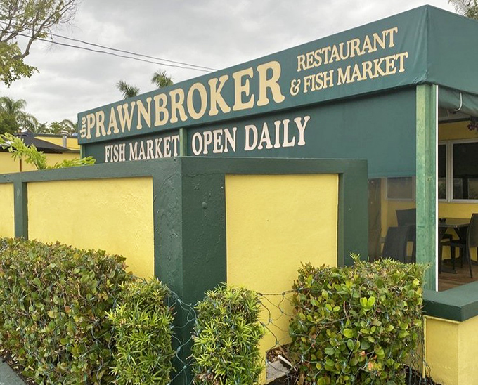 The sign promises two treasures in one stop: a restaurant AND a fish market. Like finding a library with a chocolate shop inside &ndash; double the pleasure.