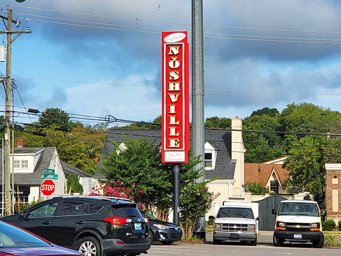 The vertical sign stands proud against the Tennessee sky, a red beacon of hope for anyone whose stomach is running on empty.