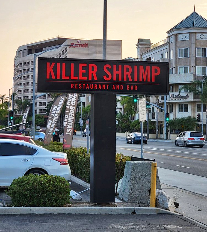 The bold red signage stands like a beacon for hungry travelers&mdash;less "Here be dragons" and more "Here be delicious shrimp."