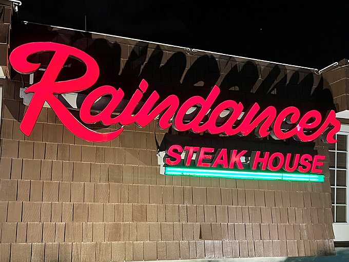 The iconic Raindancer sign beckoning hungry travelers like a neon lighthouse guiding ships to their delicious destiny.
