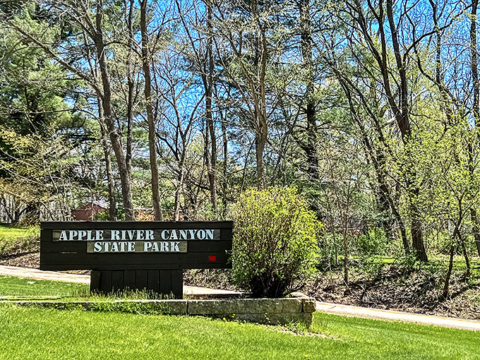 The park entrance sign doesn't shout&mdash;it simply announces you've arrived somewhere special, like the opening line of a great story.