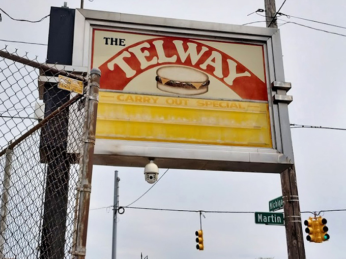 This weathered sign has witnessed decades of satisfied customers discovering culinary treasures within these walls.