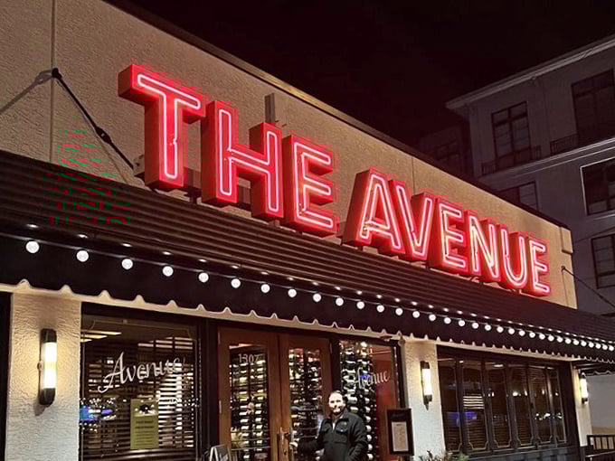At night, that neon sign transforms from restaurant marker to urban lighthouse, guiding hungry souls to beefy salvation.