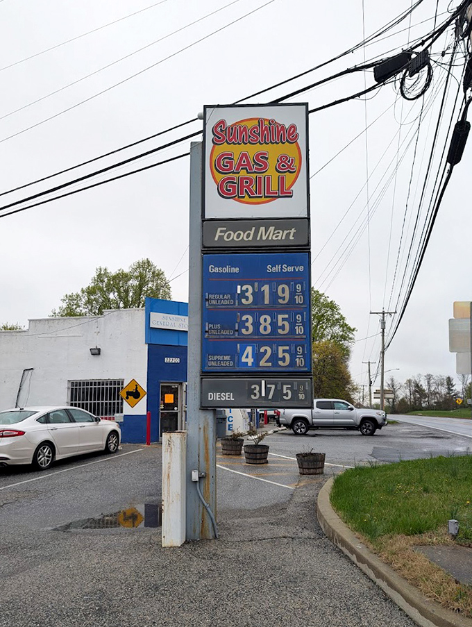 The roadside sign announces "Sunshine Gas & Grill"&mdash;a humble declaration that hides the extraordinary burger experience waiting inside.