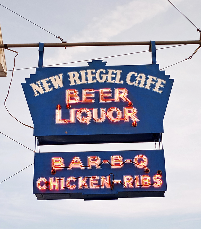 When the neon lights up against the Ohio sky, it's not just a sign – it's a beacon calling you home to comfort food that defies all big-city pretensions.