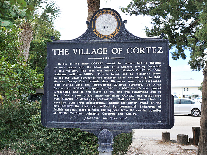 The Village of Cortez historical marker tells the story of this resilient fishing community that's weathered storms both literal and economic.