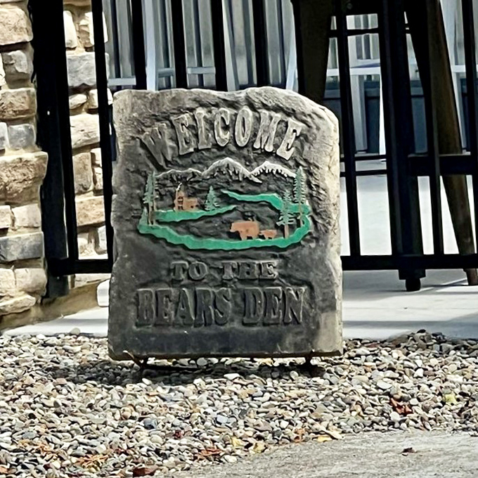 Even the welcome stone promises wilderness charm. This entrance sets the stage for the rustic culinary adventure waiting just beyond the door.