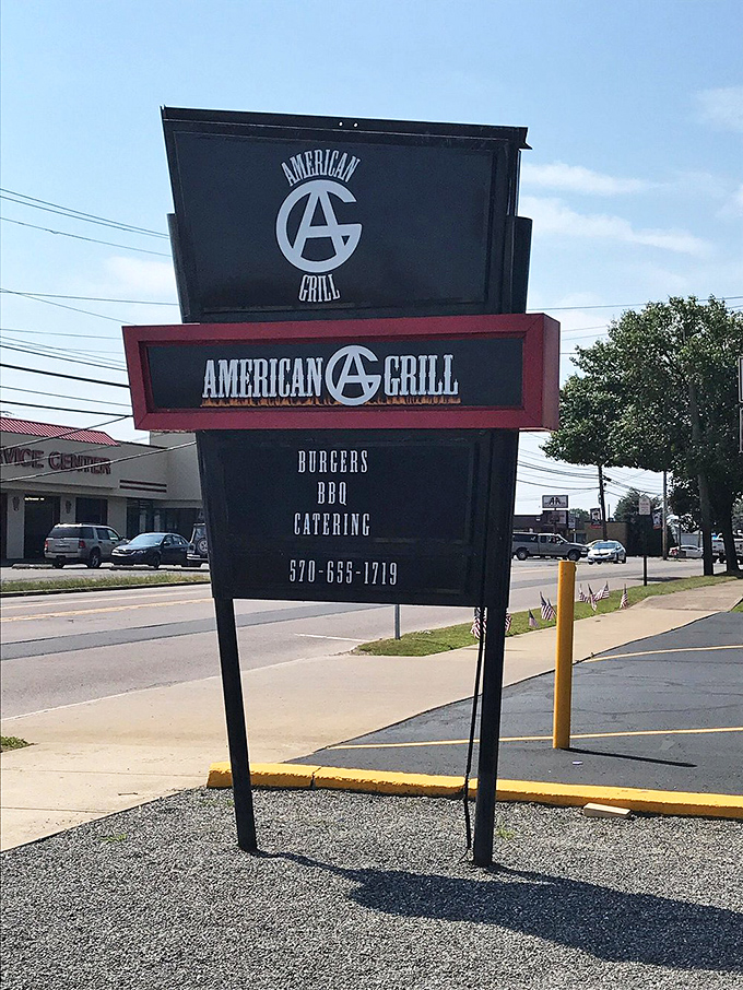 The roadside sign stands tall, a beacon of BBQ hope for hungry travelers. Simple, straightforward, and promising exactly what you need &ndash; great food without pretense.