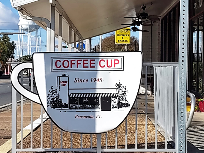 The cup-shaped sign says it all—this place has been pouring coffee and serving comfort since 1945. Some traditions are worth preserving, especially delicious ones.