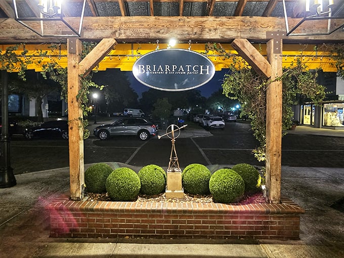 As evening falls, Briarpatch's entrance glows like a beacon for those seeking comfort food that transcends the ordinary.