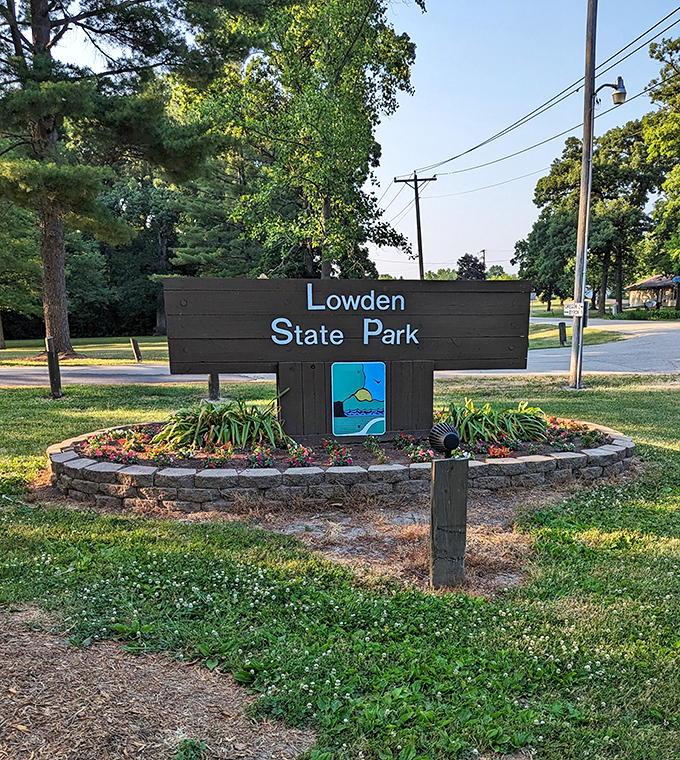 The unassuming entrance sign that promises so much more than it lets on&mdash;like finding a five-star resort behind a modest front door.