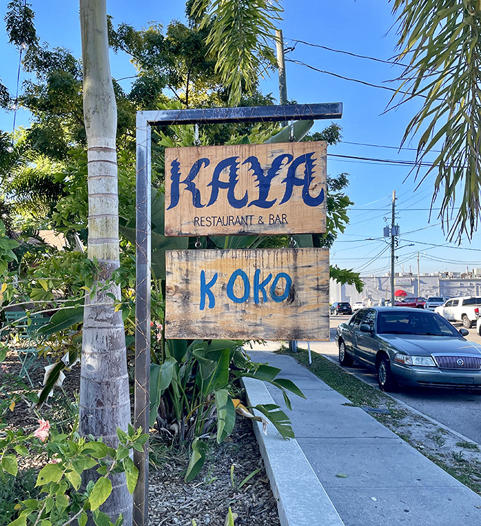 "The wooden sign stands like a beacon for flavor-seekers. 'KAYA' isn't just a name – it's your new answer to 'Where should we eat tonight?'"