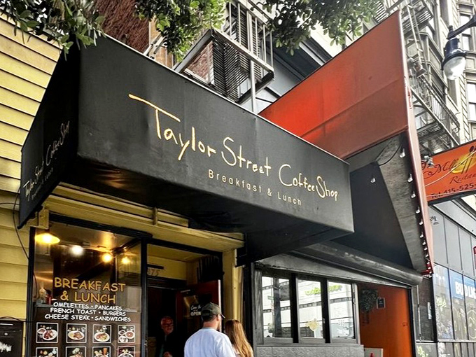 The iconic black awning announces "Breakfast & Lunch" with understated confidence&mdash;no flashy gimmicks needed when your food speaks volumes.