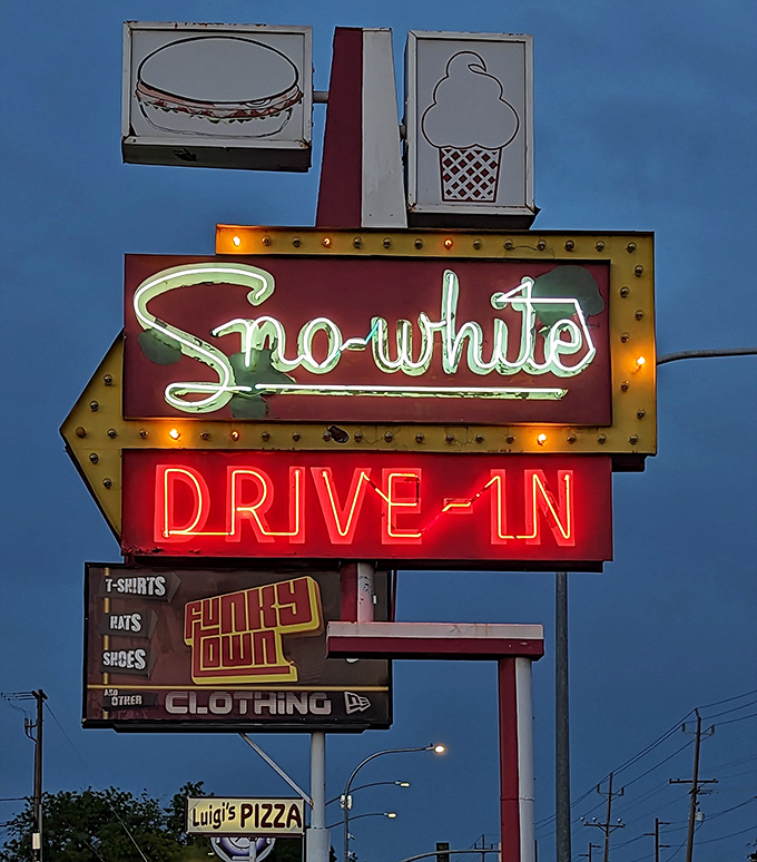 When the sun sets and the neon glows, Sno-White transforms from simple drive-in to magical roadside beacon.