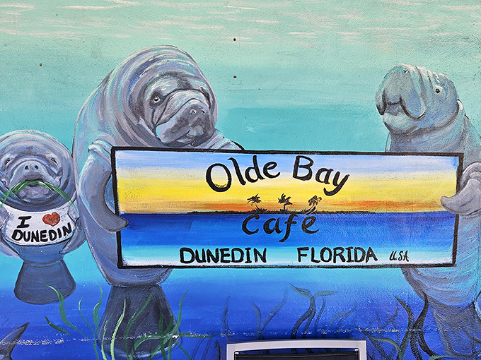 Local marine life gets artistic representation&mdash;these painted manatees aren't just mascots, they're the unofficial greeters of Dunedin's beloved waterfront eatery.