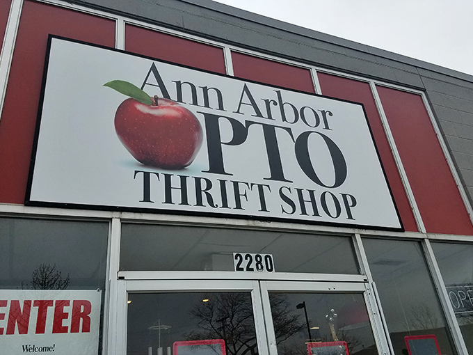 The iconic apple logo signals both education and bargain hunting—a perfect symbol for a place where shopping and supporting schools create the sweetest of partnerships.