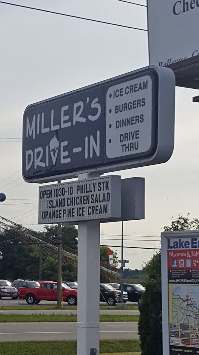 The roadside sign stands as a beacon of hope for hungry travelers&mdash;its simple message promising ice cream, burgers, and a brief escape from the ordinary.