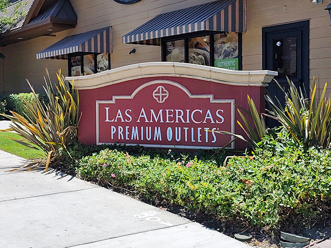 The welcoming sign that promises retail salvation &ndash; where San Diego sunshine meets discount designer goods in a match made in shopping heaven.