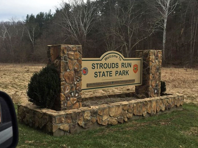 The gateway to adventure. This stone entrance sign promises experiences that no digital notification can ever match.