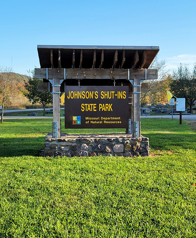 The entrance sign promises adventure while the surrounding Ozark Mountains whisper, "You're going to need more memory on that phone."