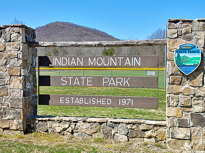 The park's entrance sign stands as a stone-and-wood welcome mat to adventures that have been awaiting visitors since 1971.
