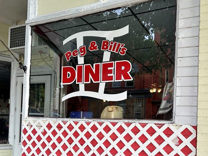 The window signage promises exactly what you'll find inside&mdash;no gimmicks, just a proper diner experience worth driving for.