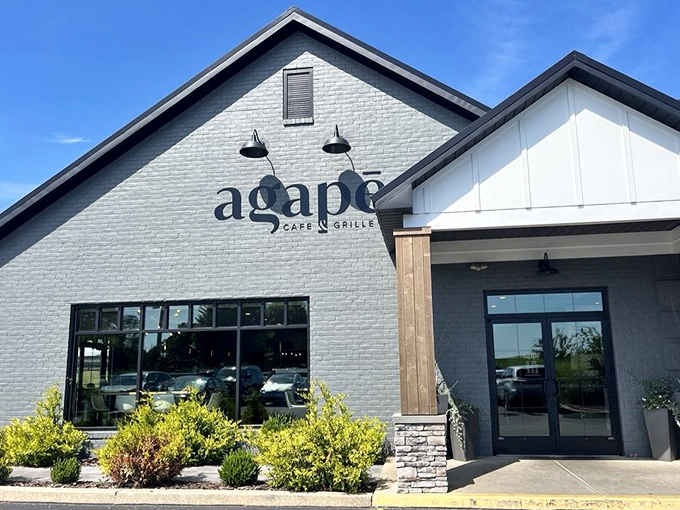 The daylight view reveals the perfect blend of modern farmhouse aesthetic&mdash;a stylish beacon for hungry travelers.