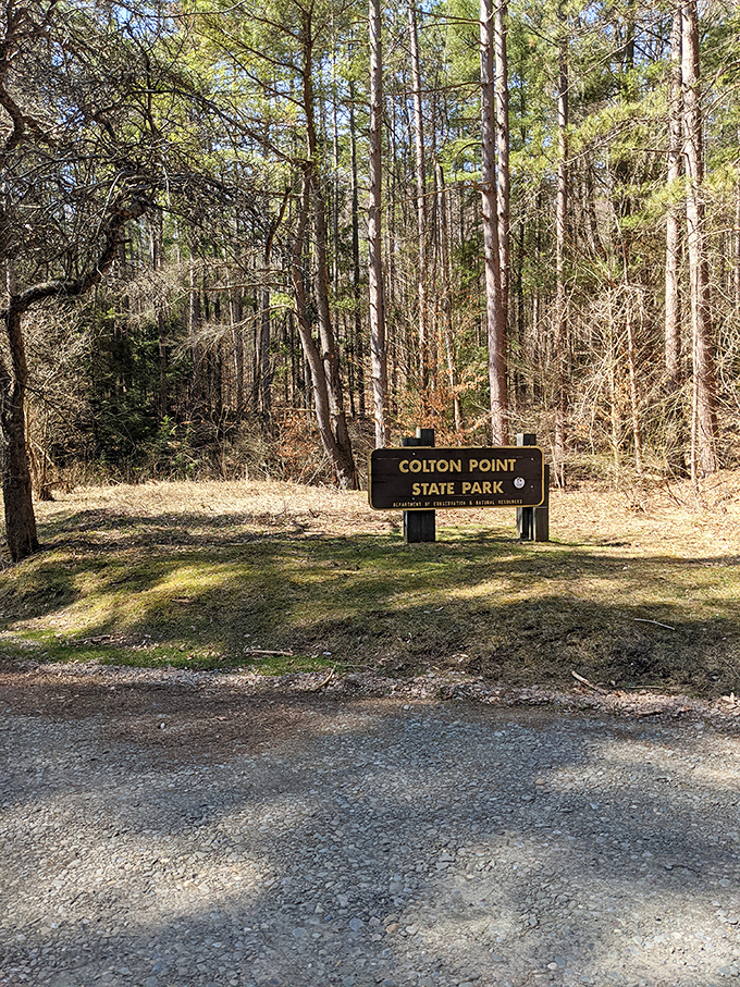 The unassuming entrance sign stands as a humble gatekeeper to one of Pennsylvania's most spectacular natural wonders.