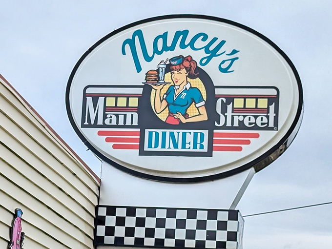 The iconic sign featuring Nancy's retro waitress has become a beacon for hungry travelers and locals alike, promising honest food and zero pretension.