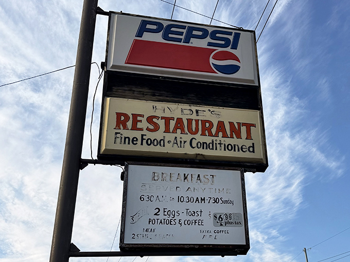 The iconic Hyde's sign against a blue Ohio sky&mdash;a landmark that has guided hungry travelers to delicious salvation for decades.