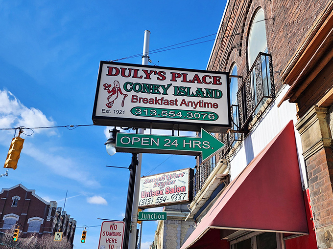 Morning light hits the Duly's sign like a spotlight on a Broadway star&mdash;except this show has been running continuously since 1921.