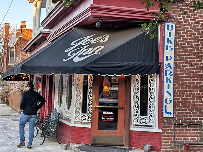 That brick corner location stands like a delicious lighthouse guiding hungry souls through the Fan District.