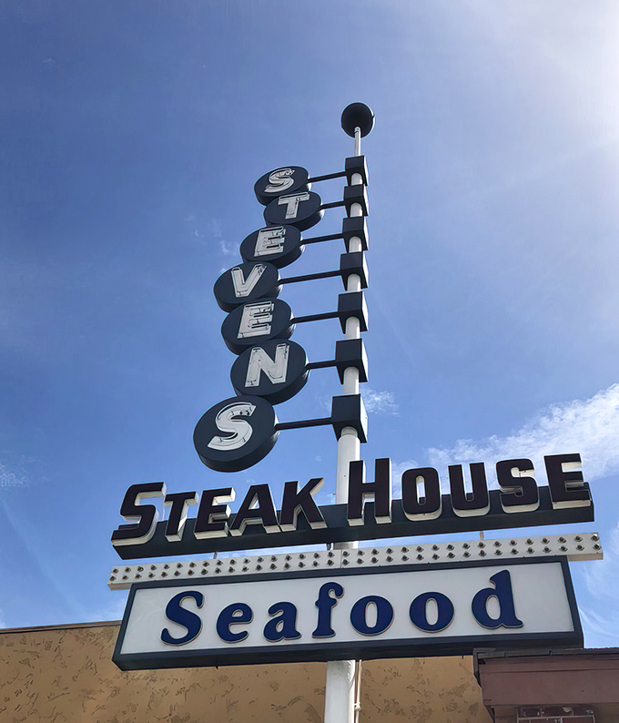 Standing tall against the blue California sky, this vintage sign has guided hungry travelers for generations. Some landmarks you follow with your stomach.