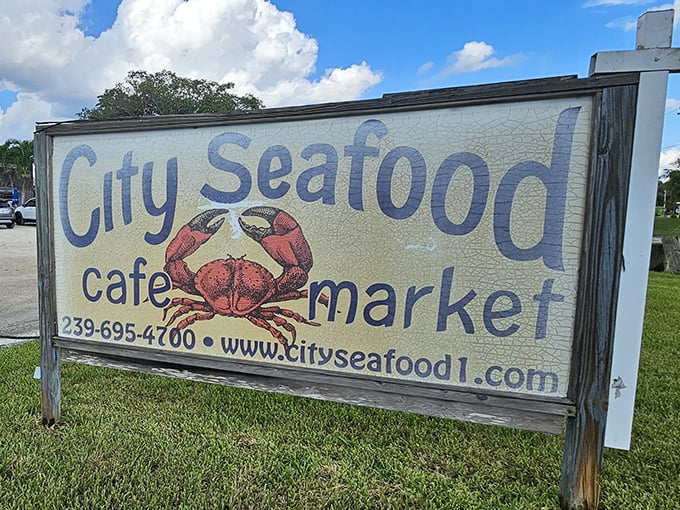 The sign says it all: City Seafood, complete with crab illustration. No fancy marketing needed when the product speaks for itself.