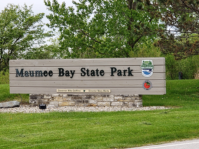 The park's welcoming sign stands as a gateway to adventure, promising 1,336 acres of natural wonders waiting to be discovered.