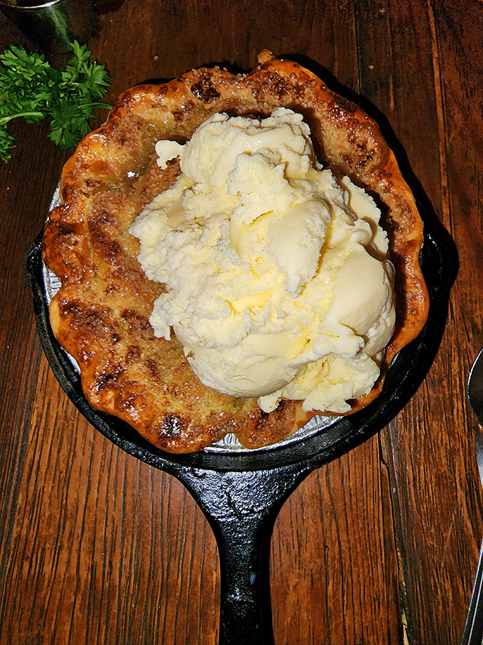 The perfect finale: a sizzling skillet pie topped with vanilla ice cream. The contrast of hot and cold creates a dessert worth saving room for.