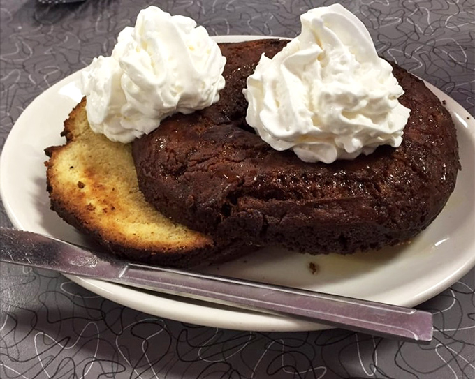 A chocolate dessert with twin peaks of whipped cream that doesn't care about your diet plans&mdash;it's here to remind you that life is short and sweet.