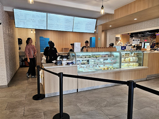 The efficient counter service keeps the line moving, but your eyes will linger on that display case long after you've placed your order.