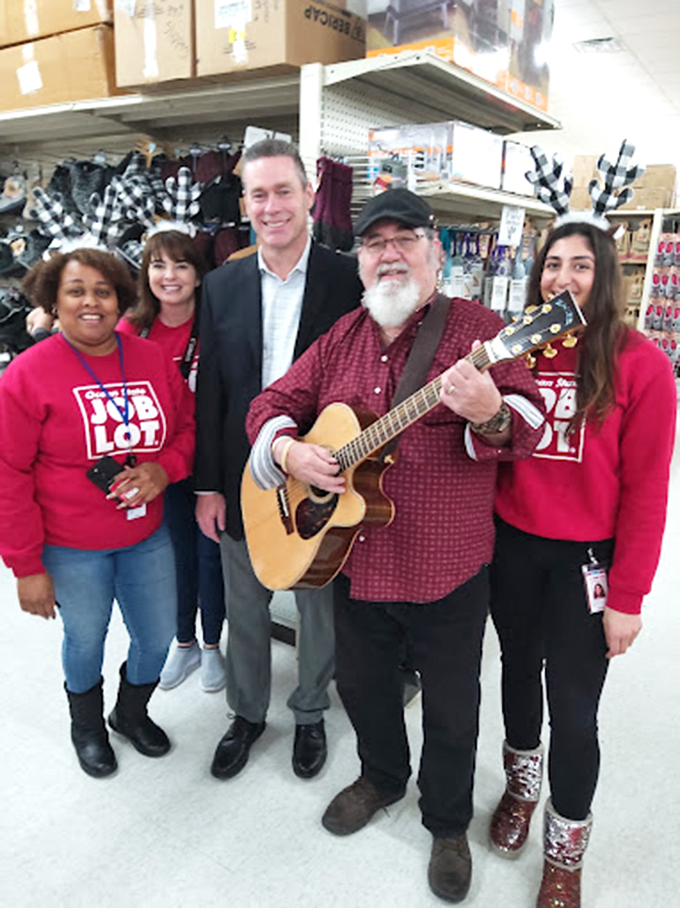 Community spirit in action – store staff and visitors sharing musical moments between aisles of incredible bargains.