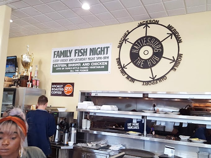 Where the magic happens&mdash;a kitchen wall adorned with local pride and the promise of "Family Fish Night" that has locals blocking their calendars weeks in advance.