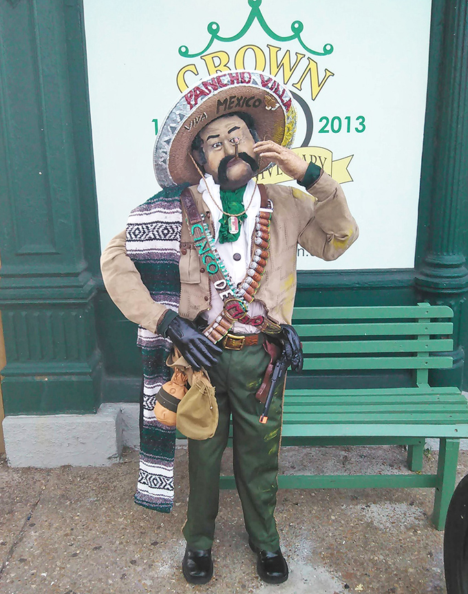 The unofficial greeter stands guard outside. This mustachioed sentinel has witnessed countless food pilgrimages and probably heard every "I'm so full" comment in existence.