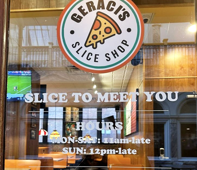 "Slice to Meet You" promises the door sign—a dad joke worthy of the cheesy perfection waiting inside from 11am until "late."