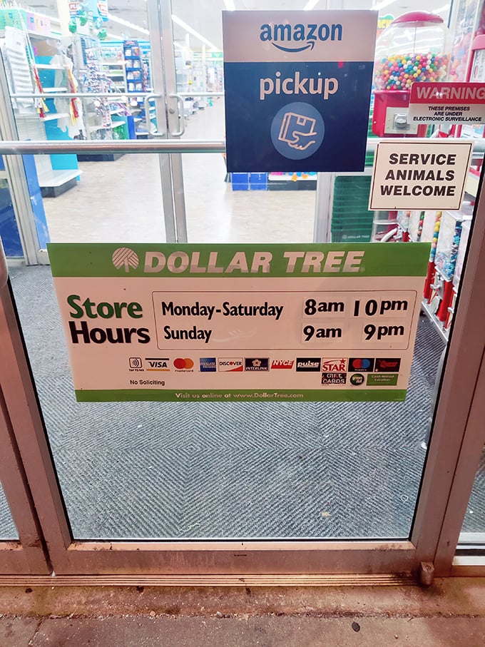 Even the store hours sign reveals modern conveniences&mdash;Amazon pickup and service animals welcome at this thoroughly 21st-century dollar store.