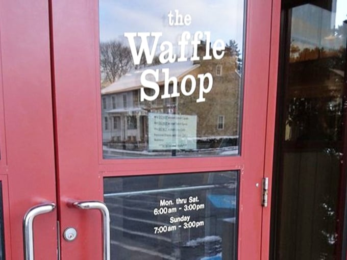 The red door announces operating hours like a breakfast invitation &ndash; come early, come hungry, and prepare to join the clean plate club.