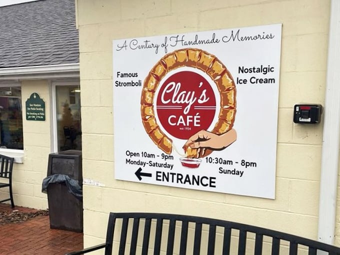The sign says it all: "A Century of Handmade Memories" wrapped around that famous stromboli. Truth in advertising at its finest. 
