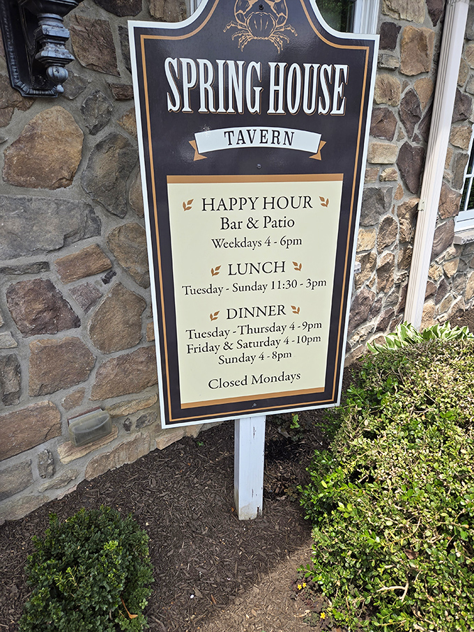 The hours posted on stone &ndash; a roadmap to happiness for hungry travelers seeking exceptional prime rib and seafood in Ambler.