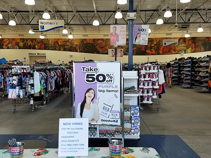 The main shopping floor, where color-coded racks and clear signage make hunting for that perfect piece less treasure hunt, more shopping pleasure.