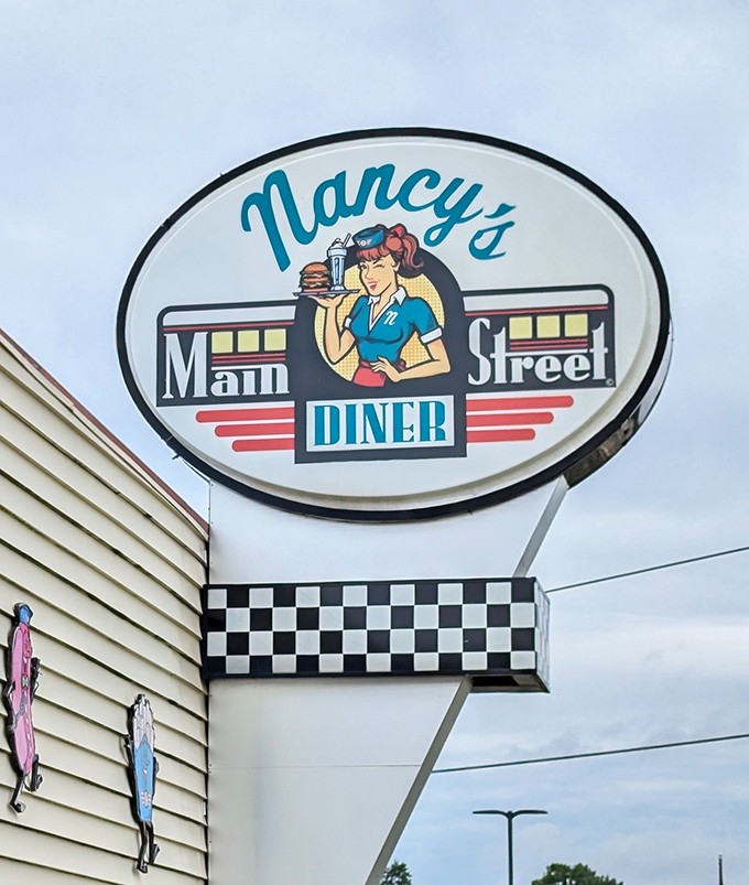 The retro sign featuring a classic diner waitress sets expectations perfectly. That cartoon smile has welcomed hungry Ohioans through good times and challenging ones alike.