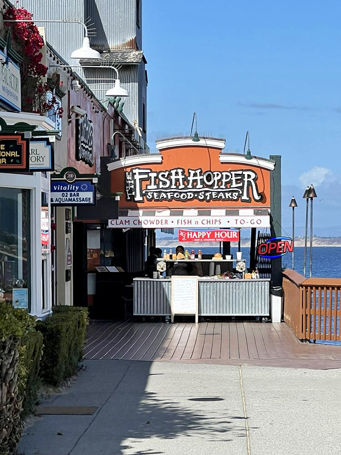 The storefront beckons from Cannery Row like a seafood siren song. That "Happy Hour" sign might be the two most beautiful words in the English language.